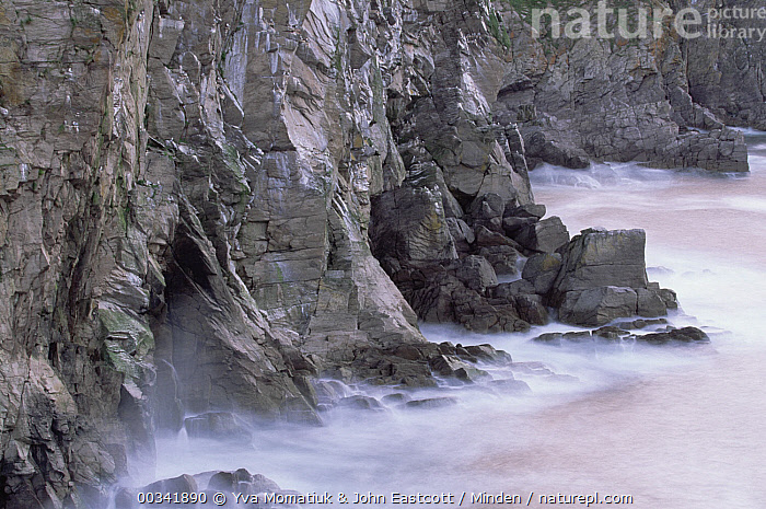 Stock photo of Evening surf pounding sea cliffs, summer, Baccalieu ...