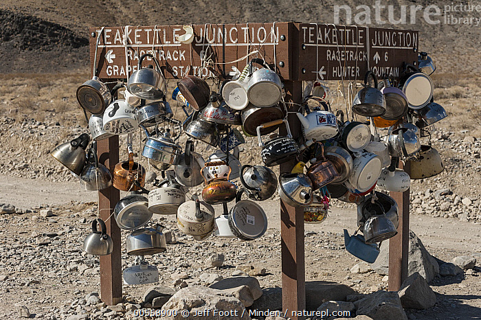 Stock photo of Sign with tea kettles, Tea Kettle Junction, Death Valley ...