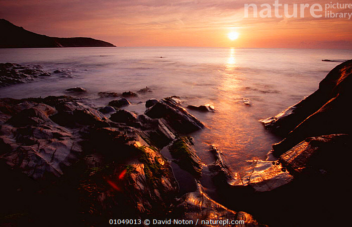 Stock photo of Coastal sunrise over Man Sands, Brixham, Devon, UK ...