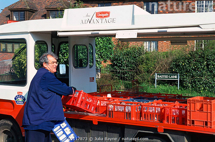 Stock photo of Milkman delivering milk, England. Available for sale on ...