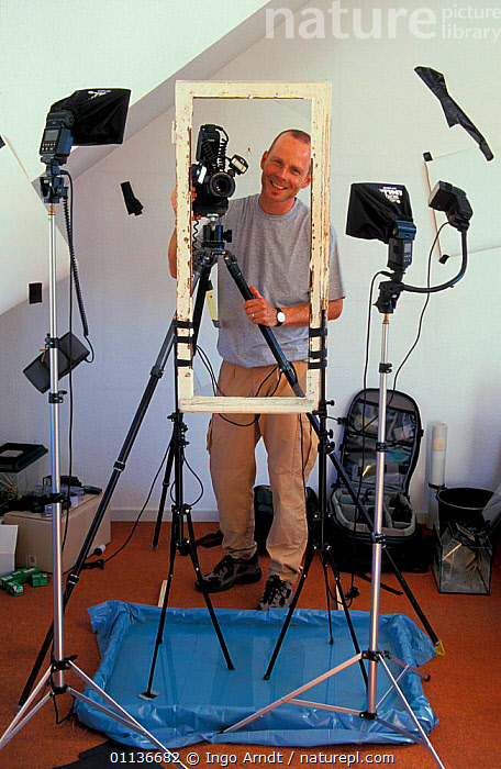 Stock photo of Photographer Ingo Arndt photographing spiders in his ...