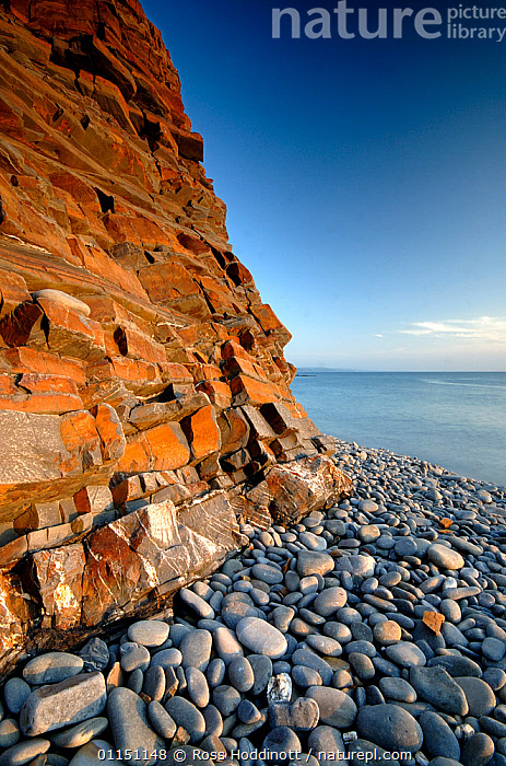 Stock photo of Rock cliff and pebble beach at Sandymouth bay, Cornwall ...
