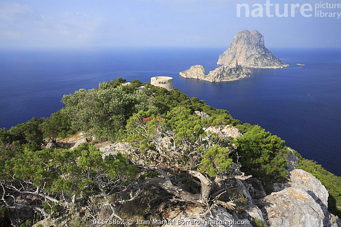 Stock photo of Coastal view from Ibiza, with Es Savinar tower and small ...