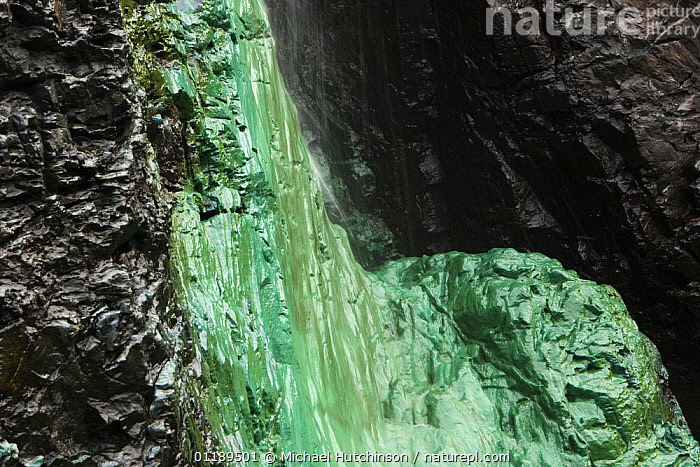 Stock photo of Close up of rock stained green by oxidized copper run ...