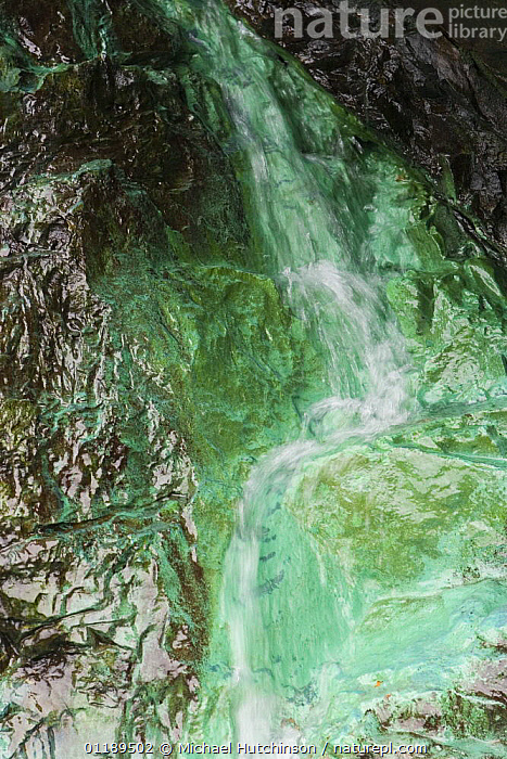 Stock photo of Rock stained green by oxidized copper run-off from ...