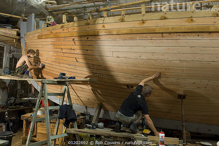 Stock photo of Shipwrights fairing the hull of Bristol Channel Pilot ...