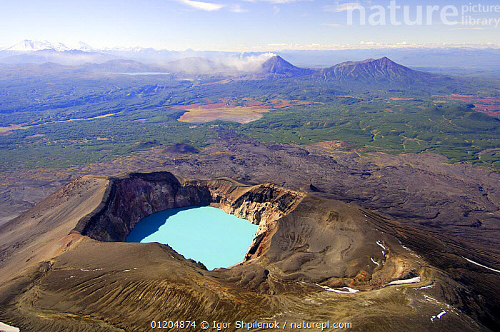 Stock photo of Aerial view of an acidic lake filling a volcano crater ...