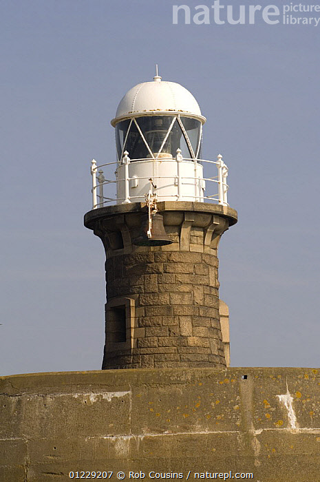 Stock photo of Lighthouse and bell tower at the entrance to the river ...