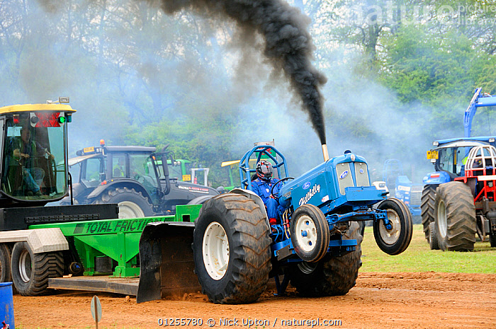 Stock photo of High powered tractor competing in a "tractor pull ...