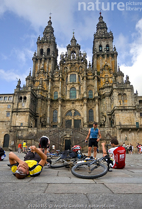 Stock photo of Bicycle pilgrims resting in front of Santiago de ...