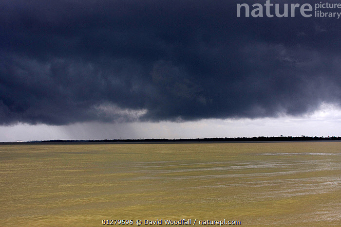 Stock photo of Dark monsoon clouds over the Pasur river, Ganges delta ...