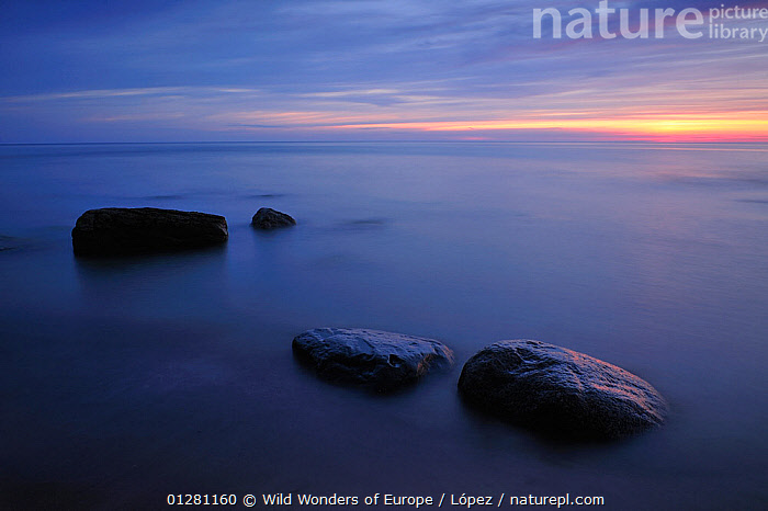 Stock photo of Baltic sea with rocks in shallow water, Latvia, June ...