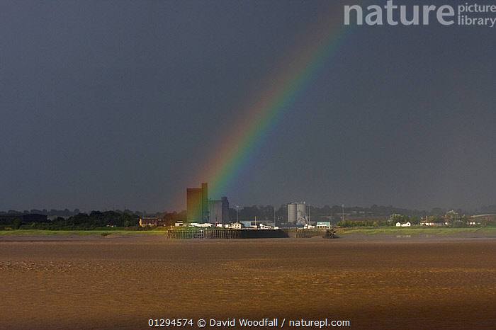 Stock photo of Storm with rainbow over Severn Estuary. Gloucestershire ...