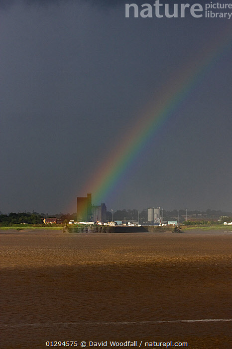 Stock photo of Storm with rainbow over Severn Estuary. Gloucestershire ...