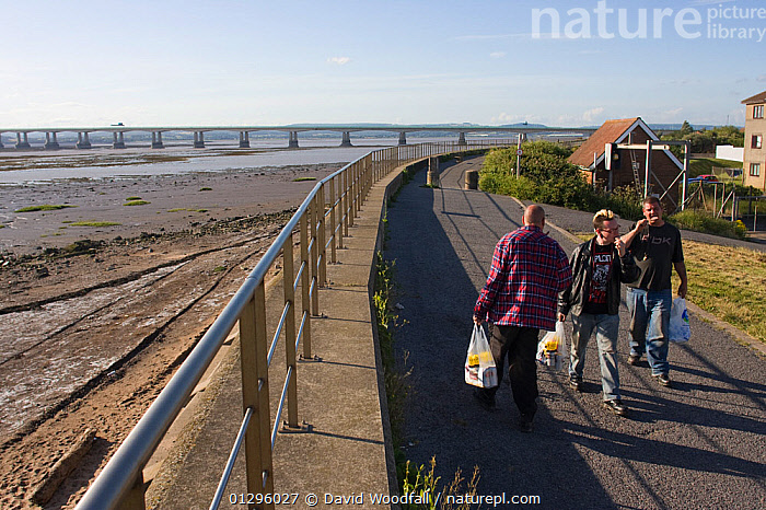 Stock photo of Group of people walking along Severnside footpath with ...
