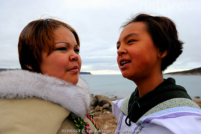 Stock photo of Double portrait of two young Inuit women singing Inuit ...