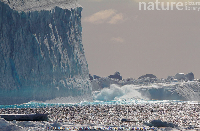 Stock photo of Waves crashing into large iceberg, Antarctica, 2009 ...