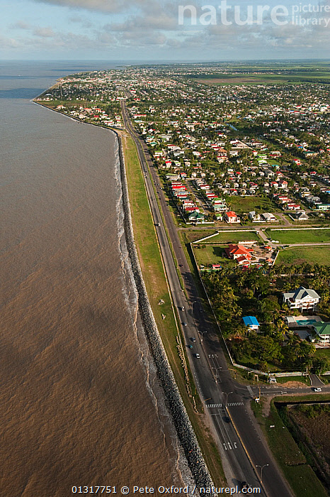 Stock photo of Aerial view of the sea wall protecting Georgetown, a ...