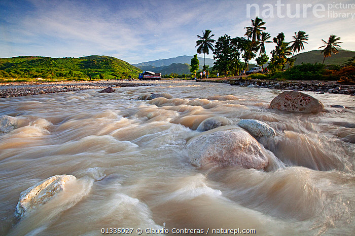 Stock photo of Fast flowing silted river, deforestation, Port-a-Piment ...