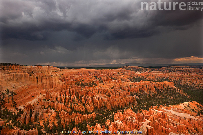 Stock photo of A thunderstorm drops heavy rain over the hoodoo ...