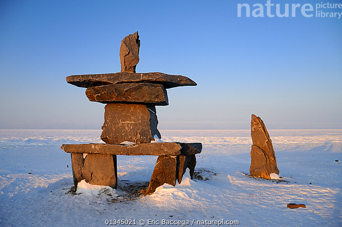 Stock photo of Inukshuk - an Inuit cairn - in an arctic landscape ...