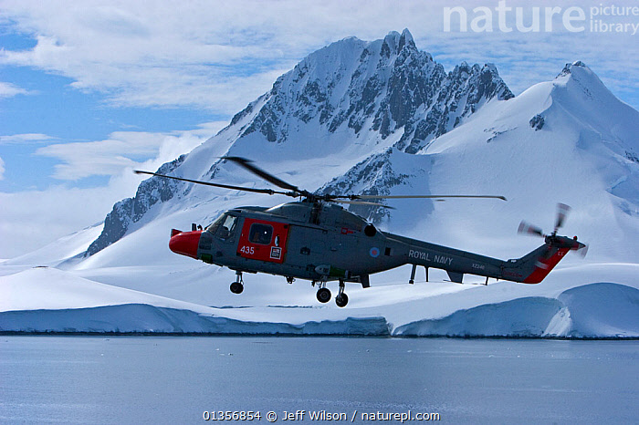 Stock photo of Royal Navy helicopter from HMS Endurance flying over sea ...