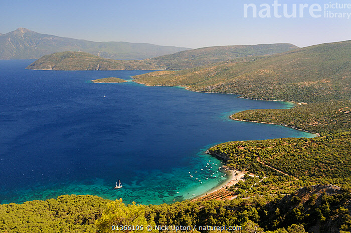Stock photo of Mourtia beach and bay with the southeast tip of Samos ...