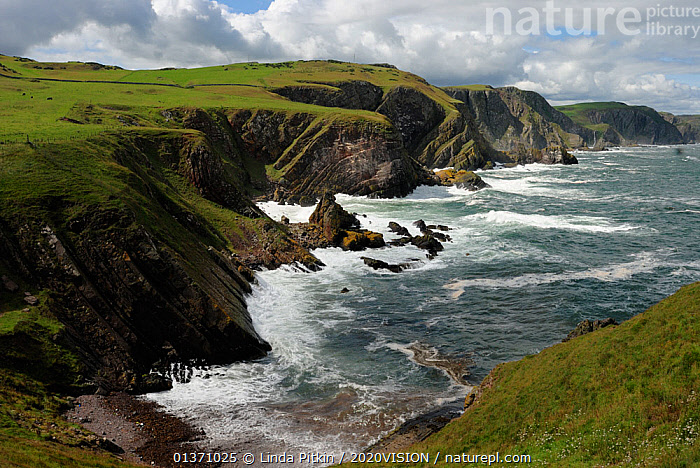 Stock photo of Cliffs showing rock striations and geological folding ...