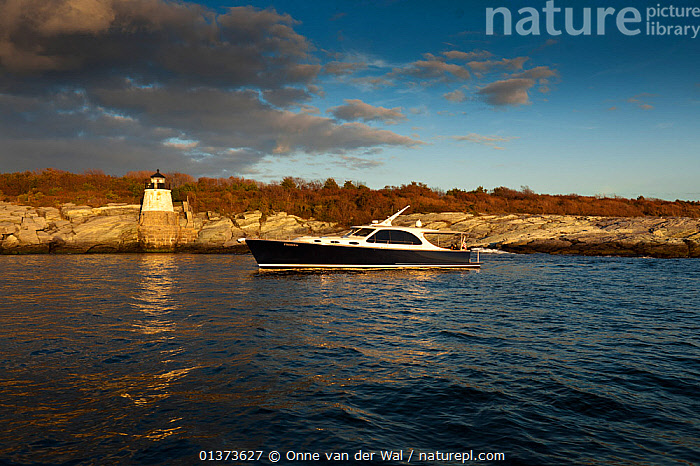 Stock photo of Ballast Point Yachts motorboat cruising past Castle Hill ...