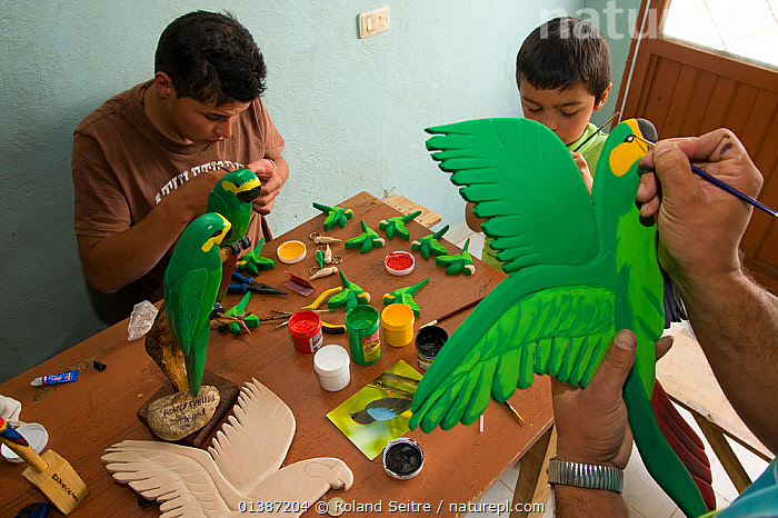 Stock photo of Frandi Rodriguez, sculptor and painter, making yellow ...