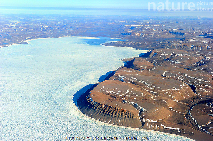 Stock photo of Aerial view of pack ice and cliffs, Devon Island ...