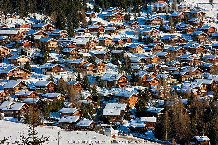 Stock photo of Looking down on town rooves, Four Valleys region, Valais ...
