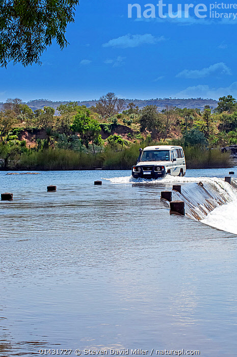 Stock photo of Four-wheel drive car, going across shortcut through ...