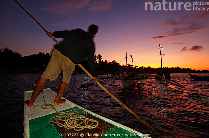 Stock photo of Man steering a bangka boat at sunset, Jao Island ...