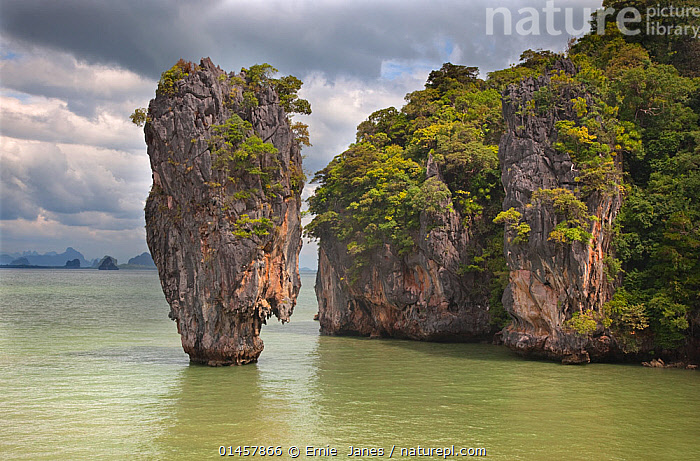 Stock photo of Limestone stack Ko Tapu Islet in front of Khao Phing Kan ...