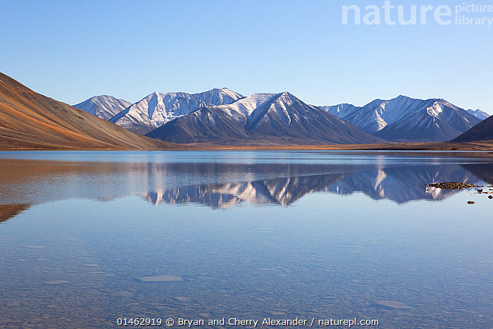 Stock photo of Mountains of the Chukotskiy Range reflected in a ...