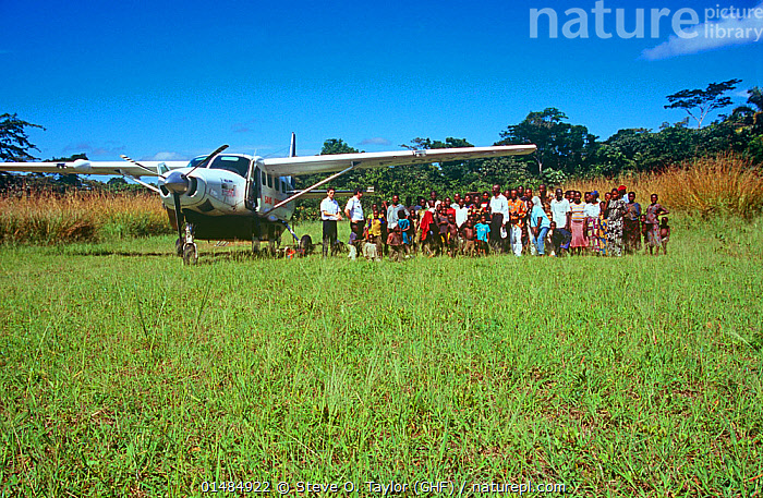 Stock photo of Batwa Pygmy villagers on Monkoto airstrip with 'Aviation ...