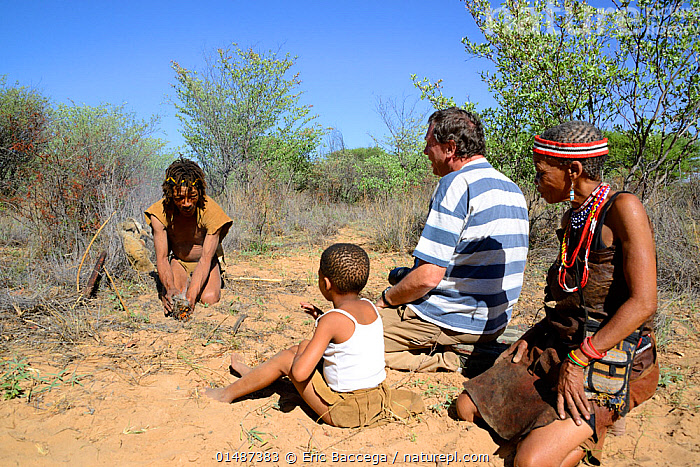 Stock photo of Photographer Eric Baccega with Naro San Bushmen family ...