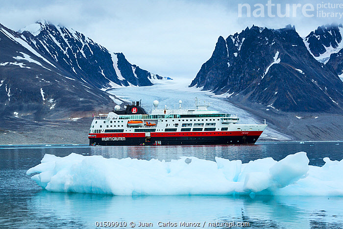 Stock photo of Expedition boat sailing through floating ice ...