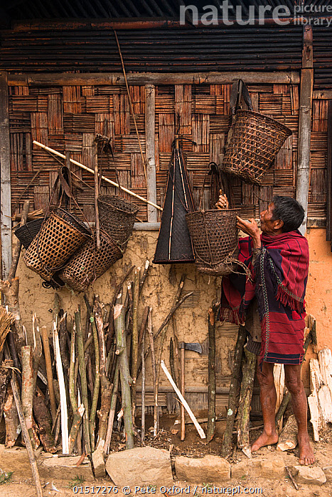 Stock photo of Man with Chang Naga baskets. Chang Naga Tribe. Tuensang ...
