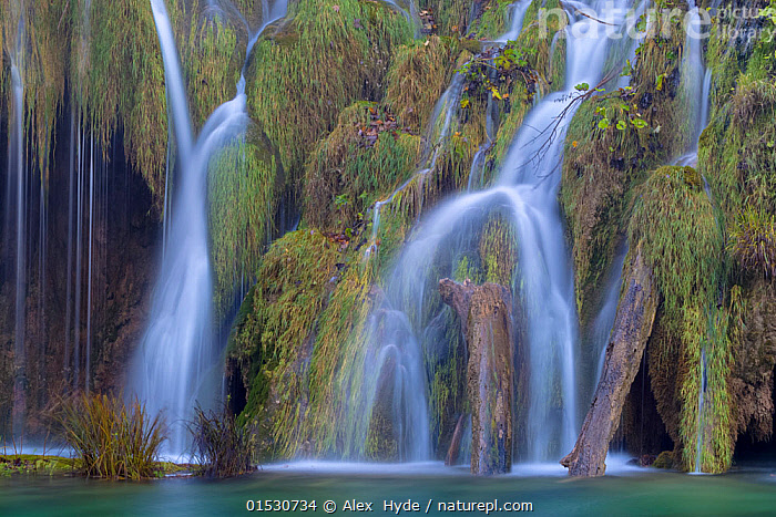 Stock photo of Water cascading over naturally formed tufa dam. Tufa is ...