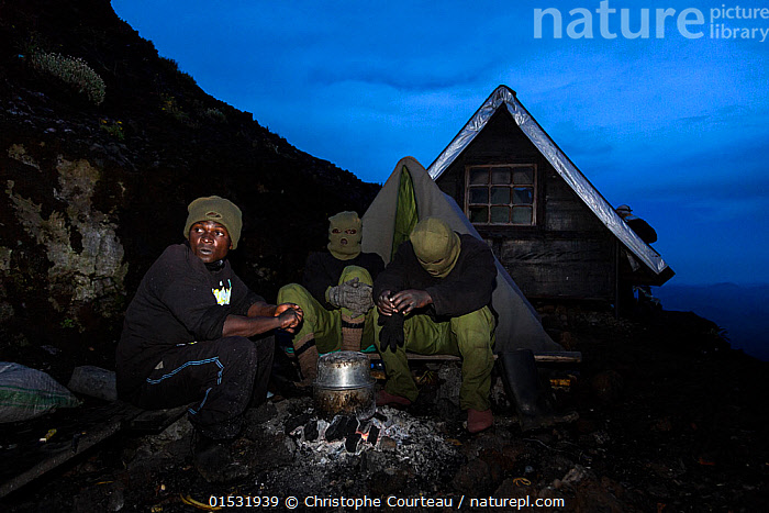 Stock photo of Virunga National Park guard at twilight, camping at the ...