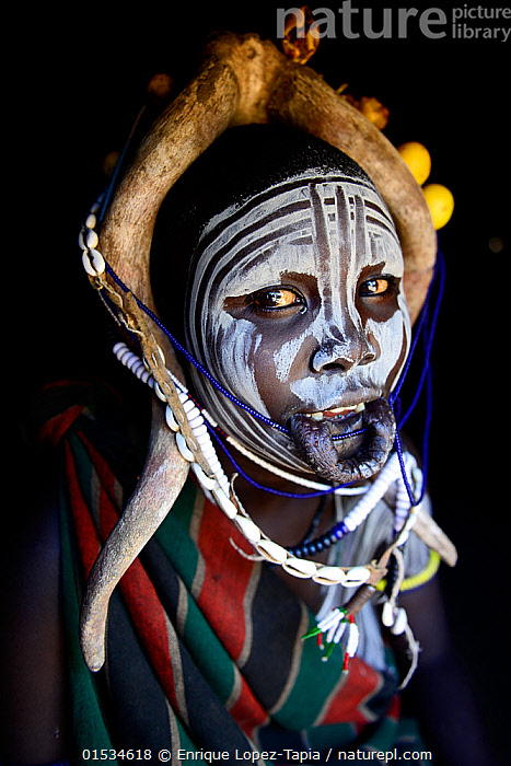 Stock photo of Woman in traditional dress. Mursi tribe, Mago National ...