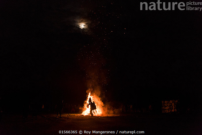 Stock photo of Baining men in traditional fire dance ceremony. Men ...