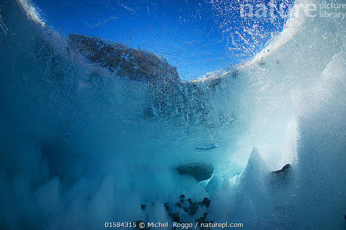 Stock photo of Underwater view of cryoconite hole, a hole formed by ...