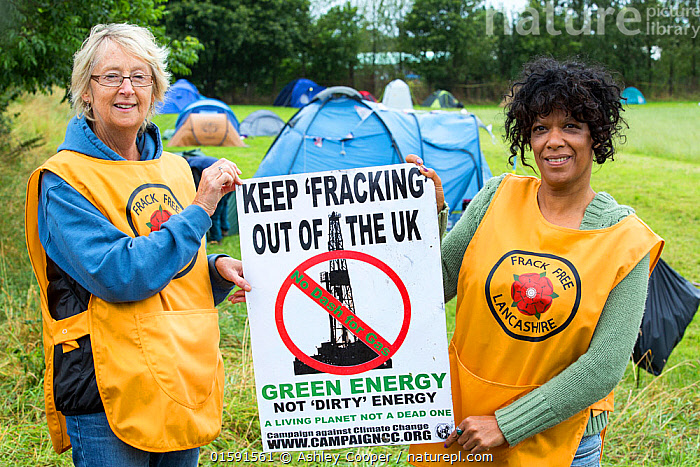 Stock photo of Women protestors with a protest banner against fracking ...