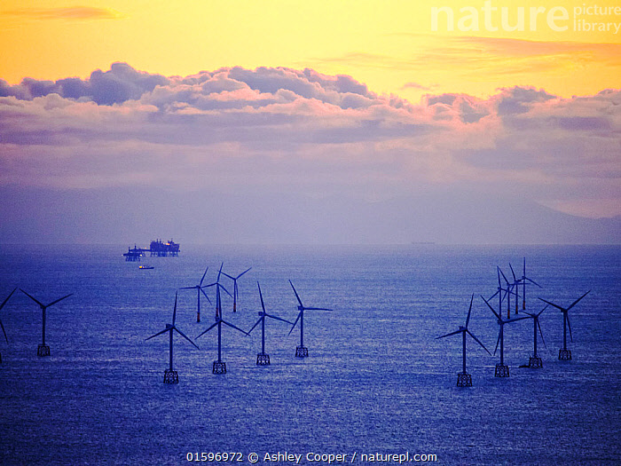 Stock photo of An Irish sea gas platform and wind turbines in the Irish ...