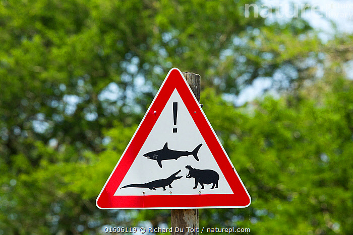 Stock photo of Sign warning about local dangerous animals including ...