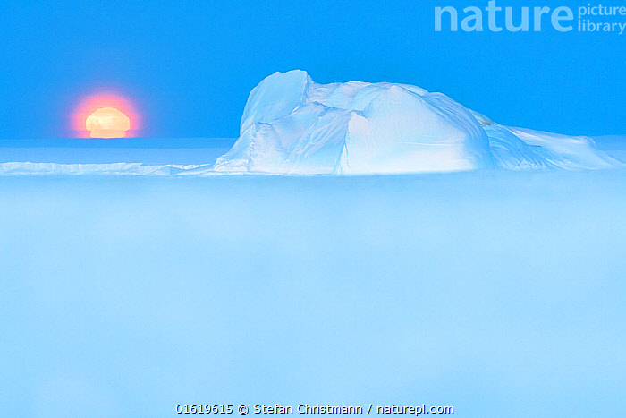 Stock photo of Moon rising over sea ice during polar night. Atka Bay ...