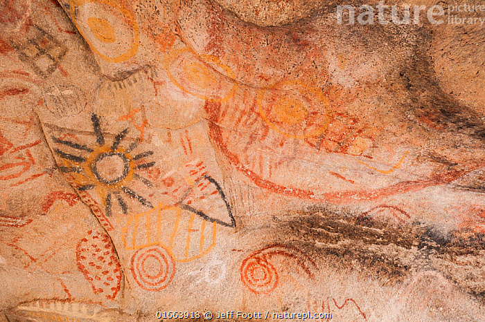 Stock photo of Rock art in cave, several circles and depiction of sun ...